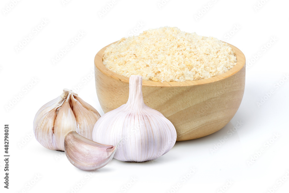 garlic and garlic powder on a white background Stock Photo | Adobe Stock