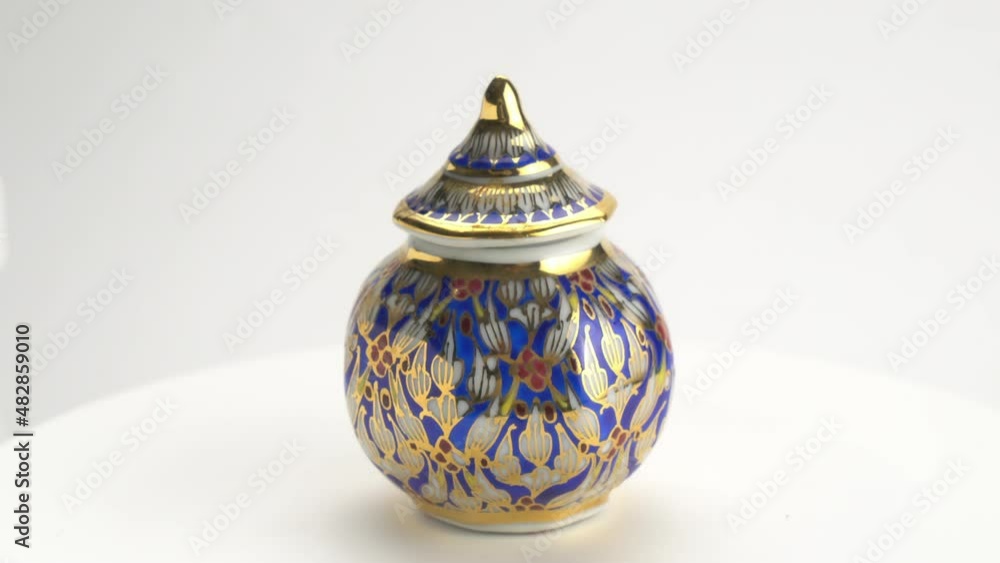 Rotation of famous beautiful souvenir Benjarong cup porcelain of ...