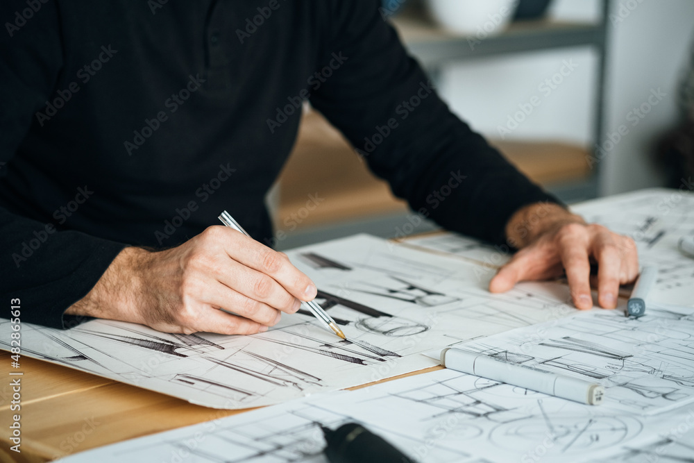 Close Up Photo of Designer Hands Drawing Blueprint Design at Design ...