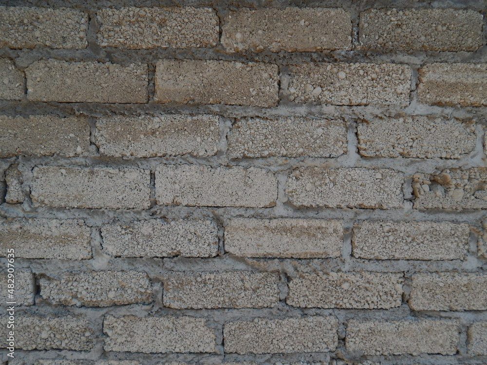 muro de tabicon cemento arena foto de Stock | Adobe Stock