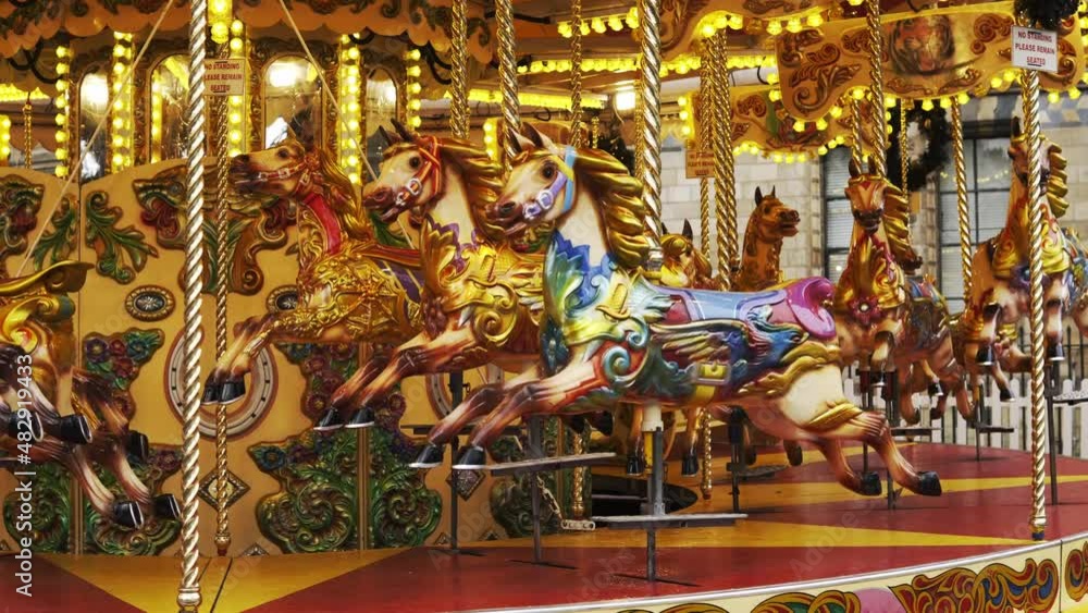 Fairground Vintage Carousel. Bright red and golden carousel with horses ...