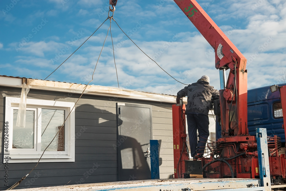 Delivery and installation of a modular frame house. Frame construction ...