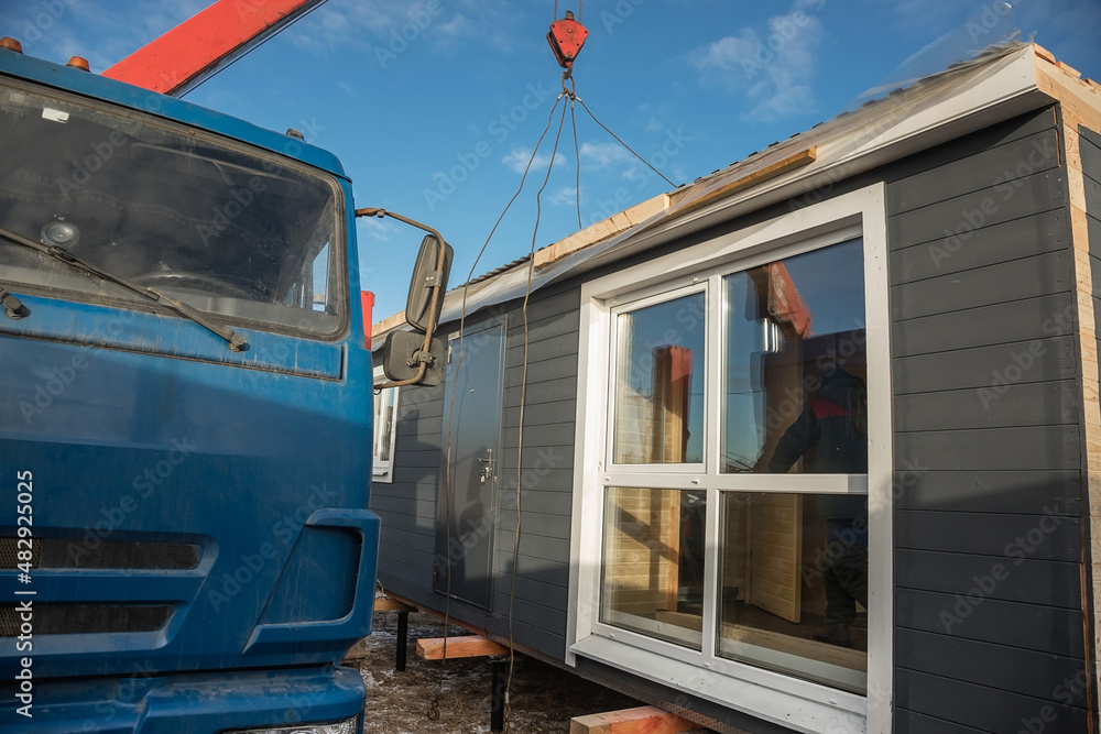 Delivery and installation of a modular frame house. Frame construction ...