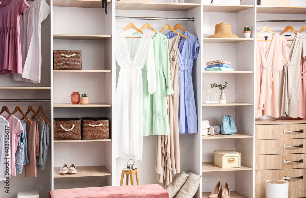 Wardrobe with different female clothes and accessories Stock Photo ...