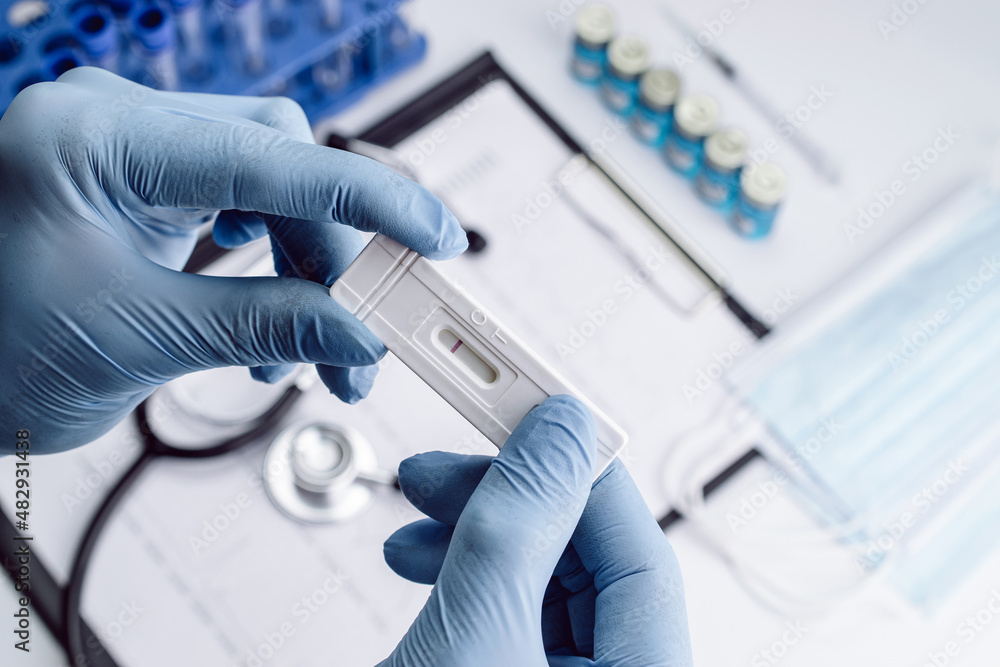 Covid test antigen coronavirus kit. Doctor holding rapid covid medical ...
