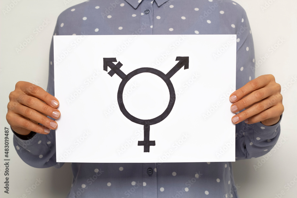 The concept of gender equality. Sign male and female symbol in hands ...