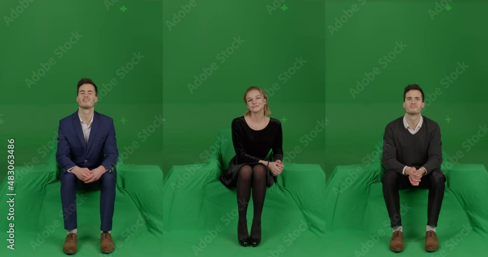 GREEN SCREEN CHROMA KEY Front view of male and female spectators ...