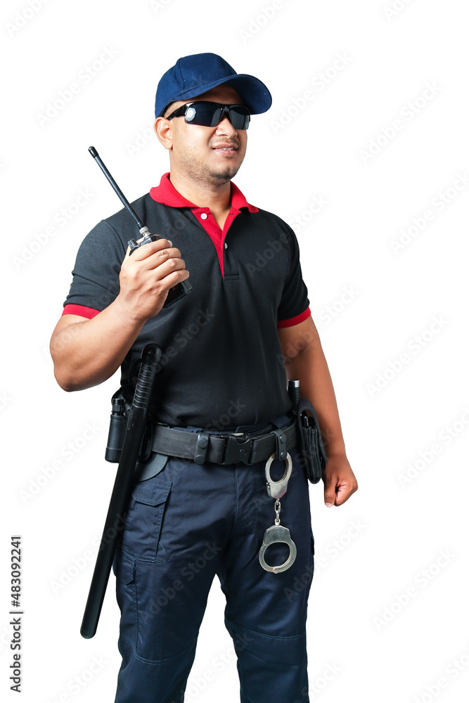 security guard wears dark glasses and wears a hat.holding a walkie ...