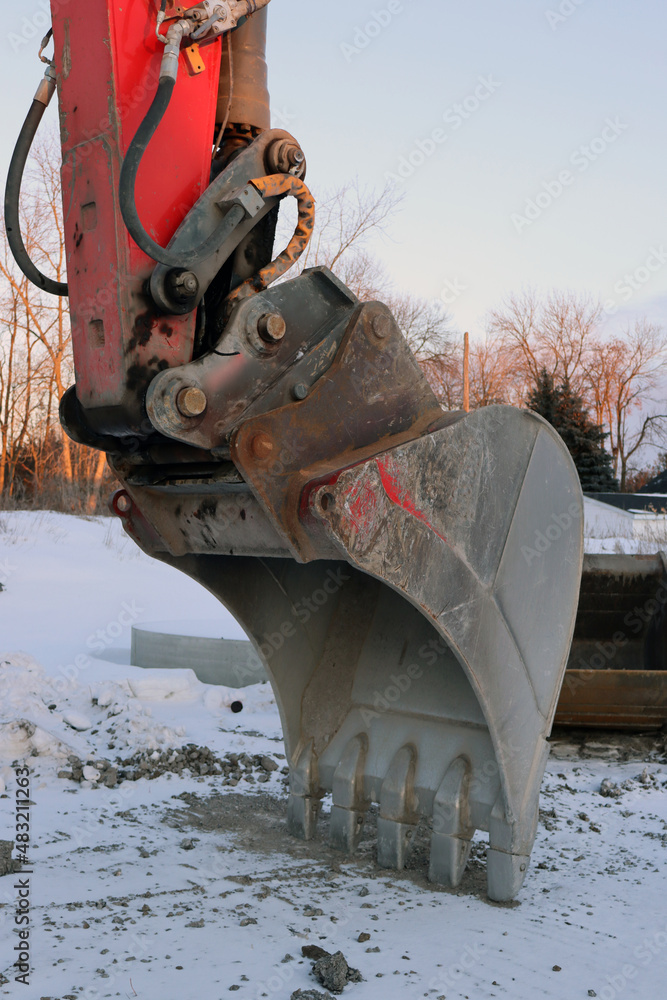 Red excavators ready to break ground and start construction on new ...