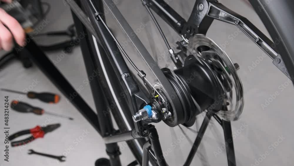 The planetary gear on a belt driven bike is rotating. Gear change ...