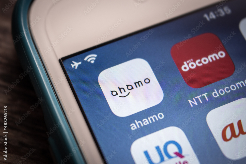 Kumamoto, JAPAN - Dec 4 2020 : The icons of Ahamo and NTT docomo on iPhone in monochrome colour ...