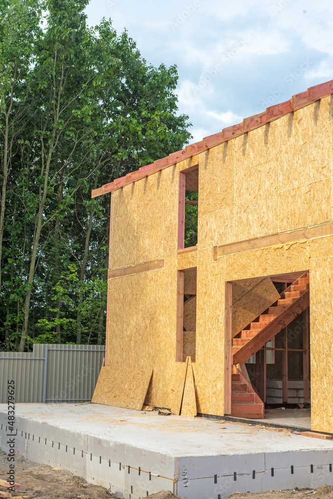 Construction of new and modern modular house. Walls made from composite ...