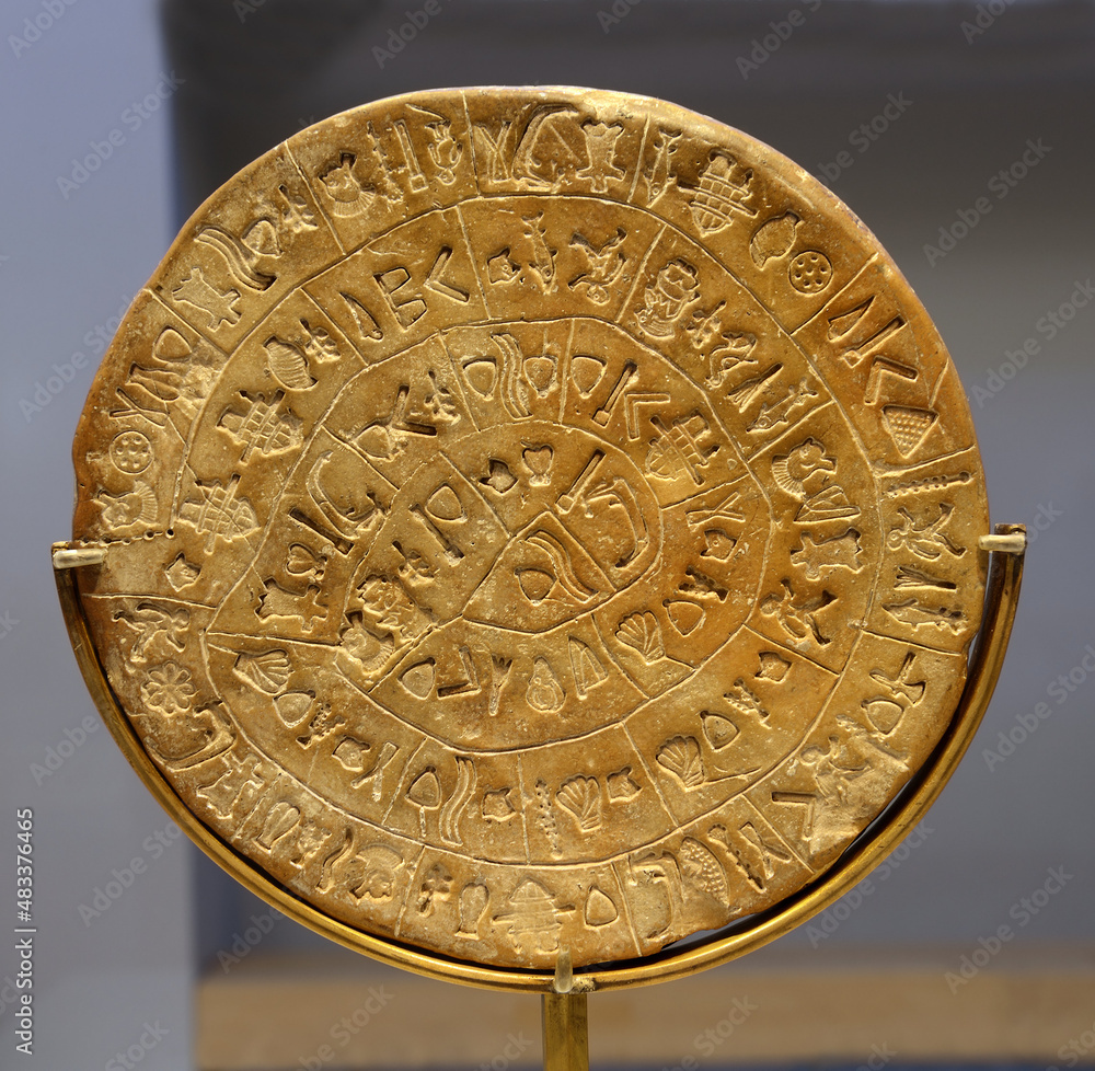 The Phaistos disk (sideB), disk of fired clay from the Minoan palace of ...