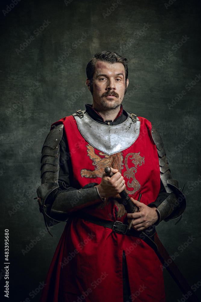 Vintage style portrait of brutal seriuos man, medieval warrior or ...