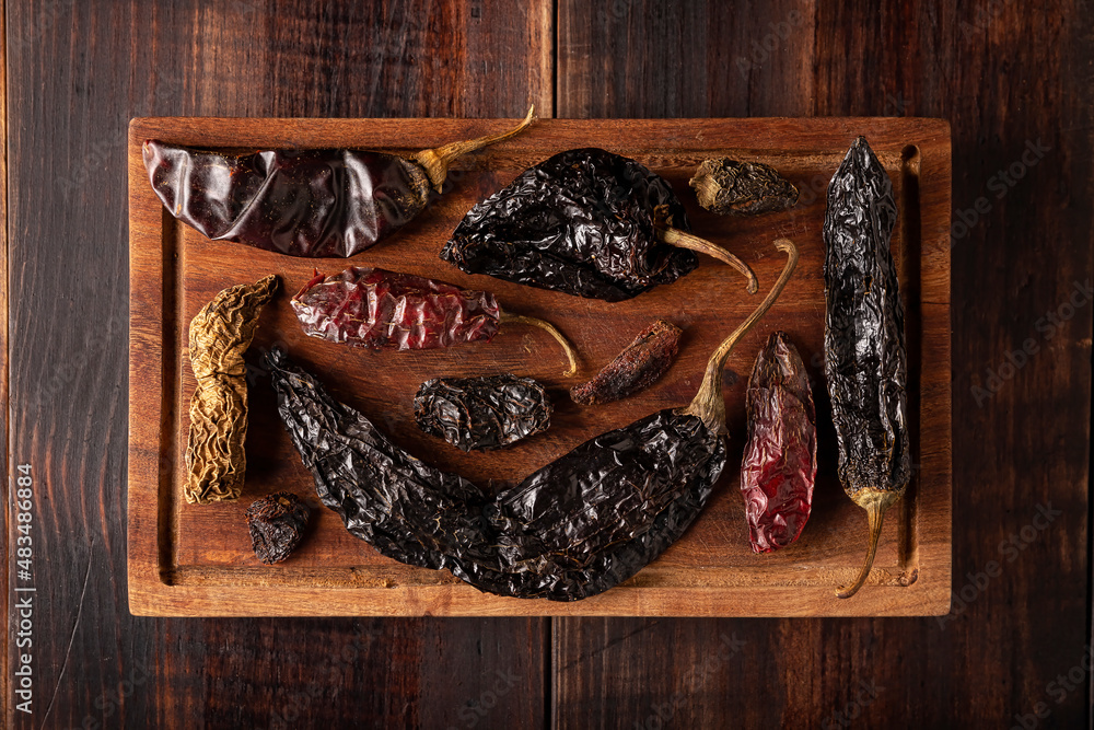 Variety of mexican dried chili. Chile Morita, Guajillo, sChipotle and ...
