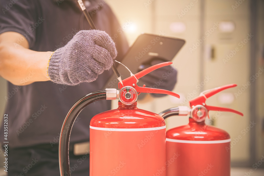 Fire extinguisher, Engineer inspection checking pressure gauge level ...