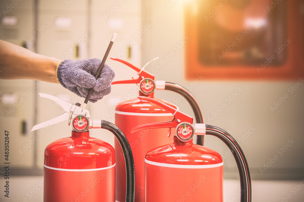 Fire extinguisher, Engineer inspection checking pressure gauge level ...