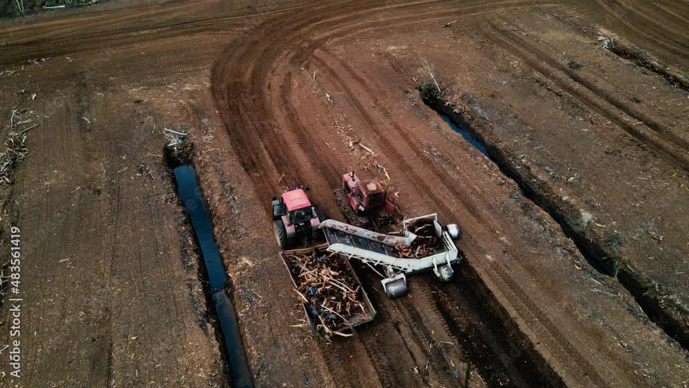 Peat Harvester Tractor on Collecting Extracting Peat. Mining and ...