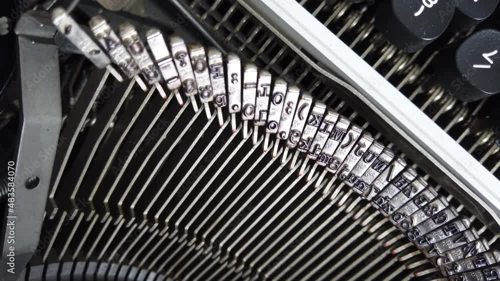 Mechanism of a retro typewriter. Old typewriter hammers. Stock ビデオ ...