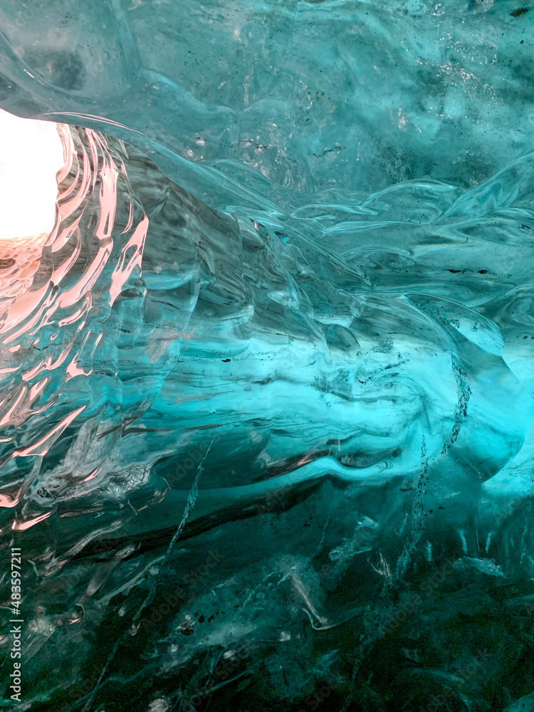 Inside the ice cave of Iceland.Natural curve of the ice with a clear ...