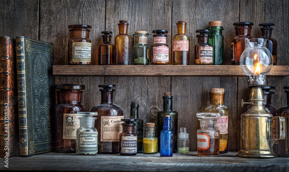 Bottles with drugs from old medical, chemical and pharmaceutical glass ...