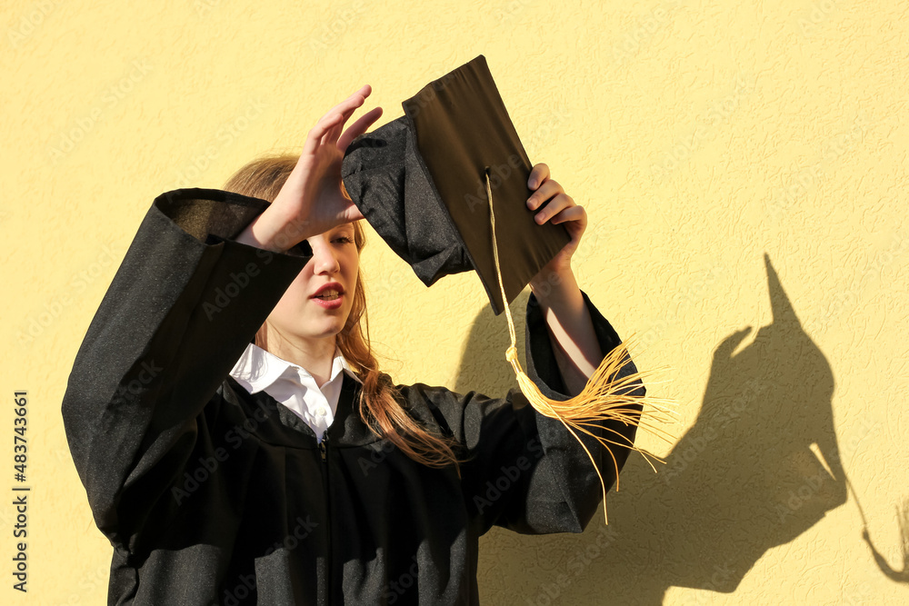 Cute teenage graduate girl laughing and having fun. No school, back to ...