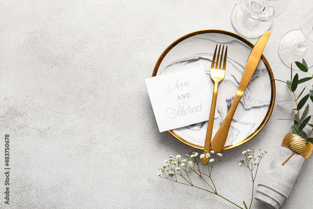 Beautiful table setting with wedding invitation on light background ...