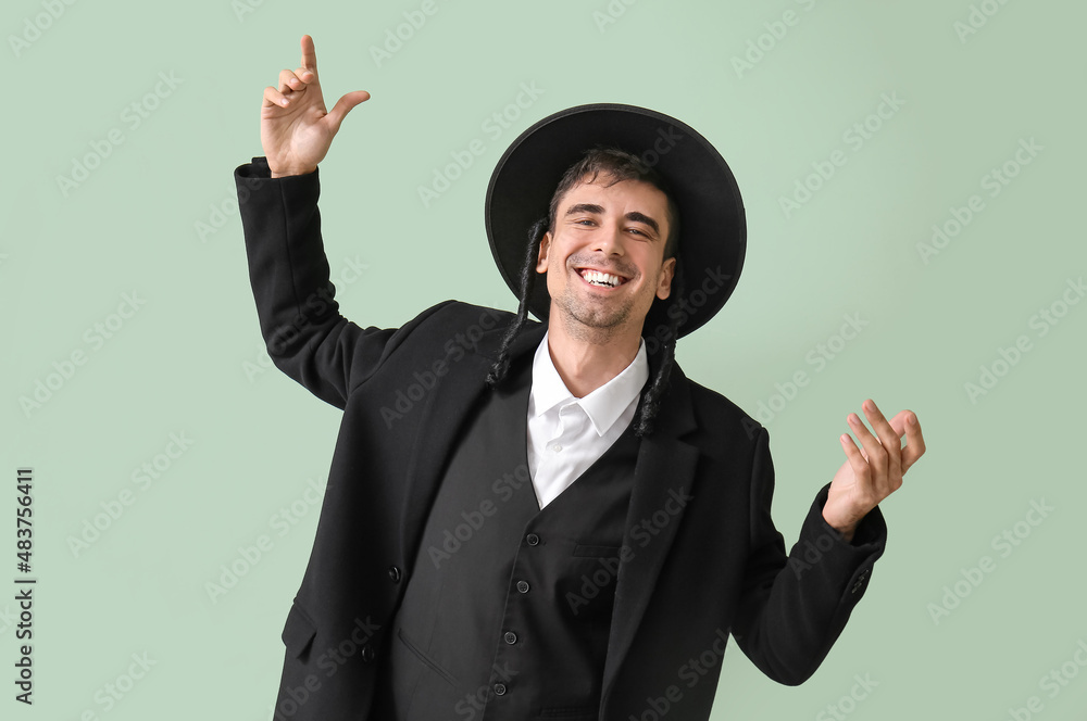Happy Hasidic Jewish man on color background Stock Photo | Adobe Stock