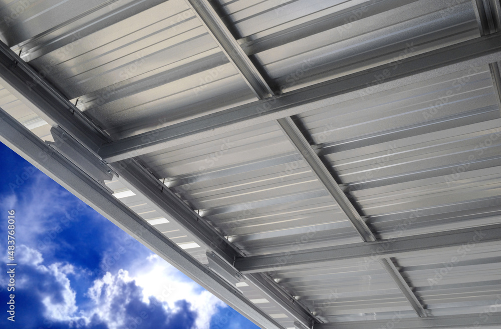 construction of the top cover of a light steel building of a house ...