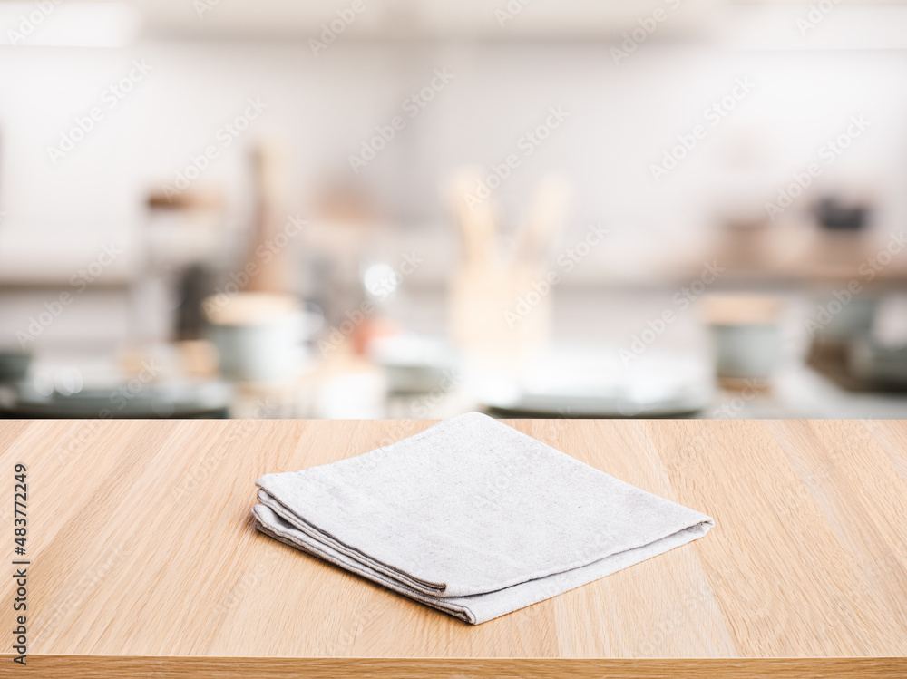 Fabric,cloth on wood table top on blur kitchen counter (room)background ...