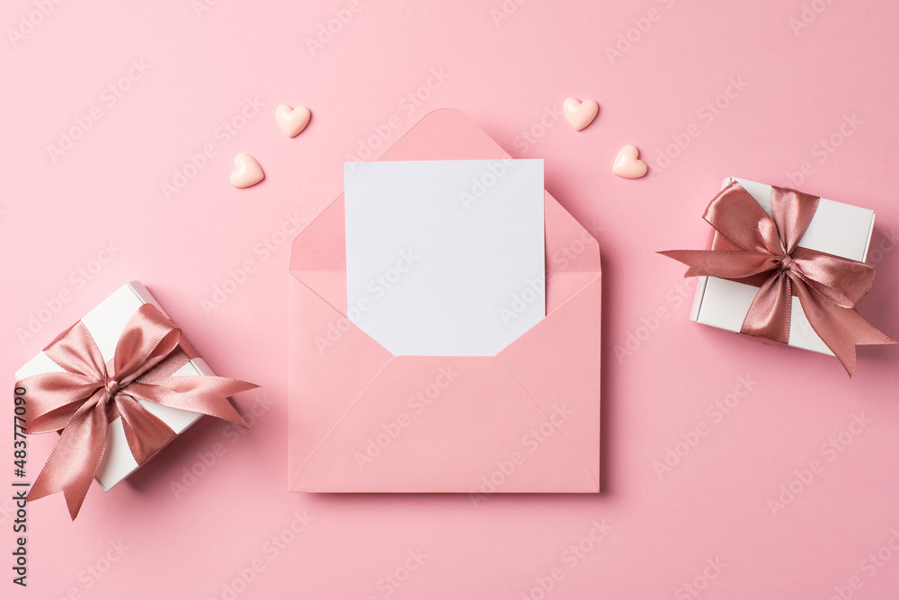 Top view photo of valentine's day decorations open pink envelope with ...