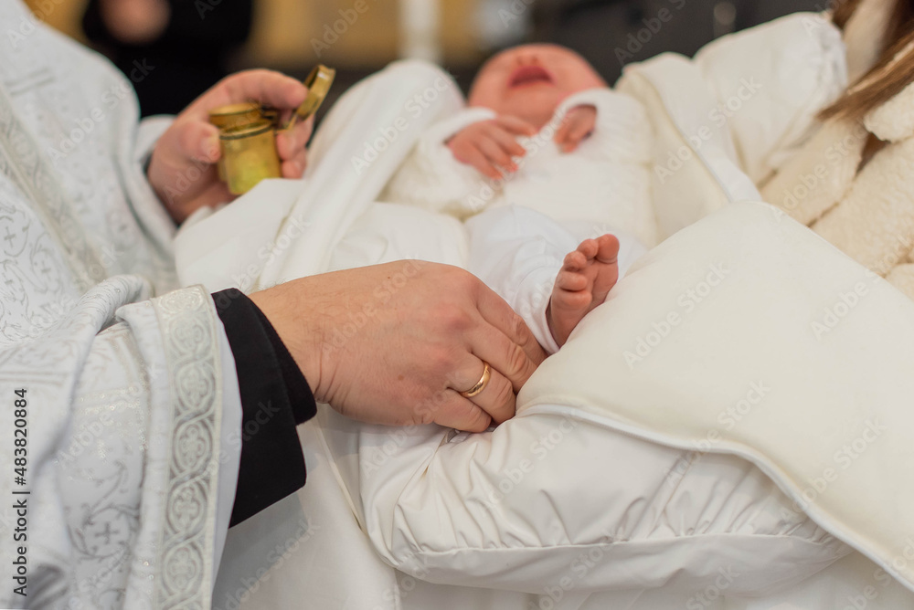 Baptism ceremony in Church. baptism of a child, the sacrament of ...