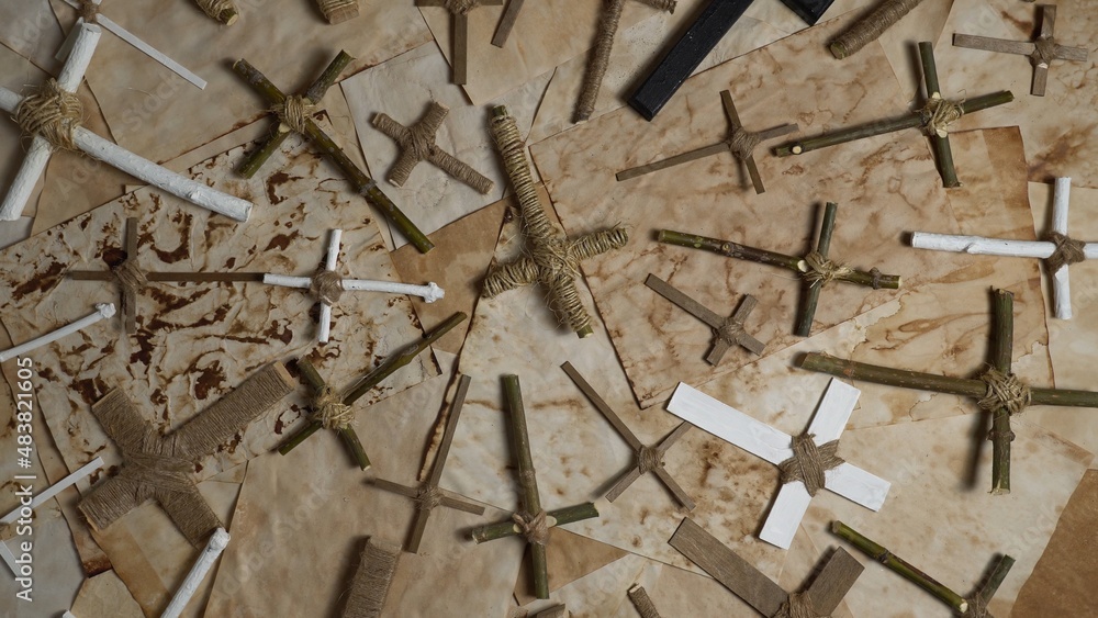 Photo & Art Print Wooden crucifixes cross on the ancient parchment ...