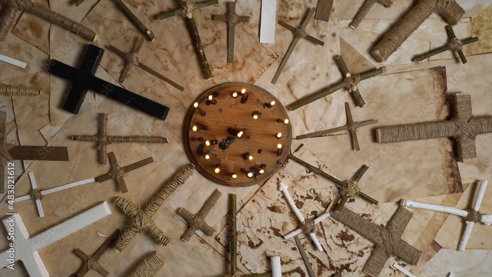 Wooden crucifixes cross on the ancient parchment paper. Handmade ...