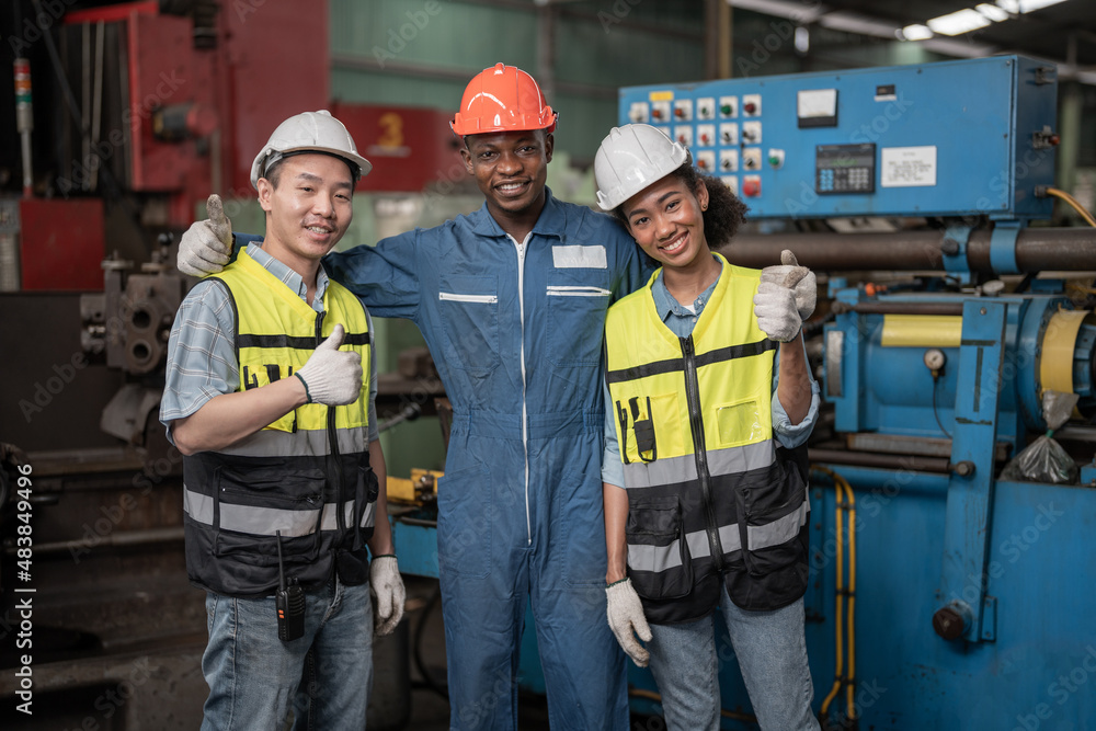 Group of Diversity factory worker people standing when success the ...