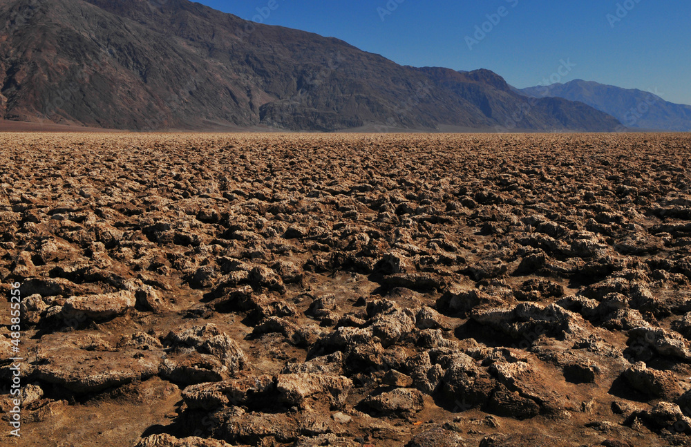 The harsh badlands known as the Devil's Golfcourse, a flat expanse of ...