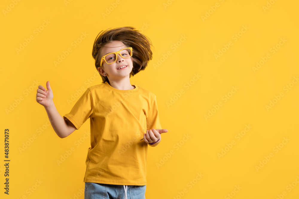 Joyful Little Kid Girl 8 10 Years Old In Yellow T shirt And Eyeglasses joyful-little-kid-girl-8-10-years-old-in-yellow-t-shirt-and-eyeglasses