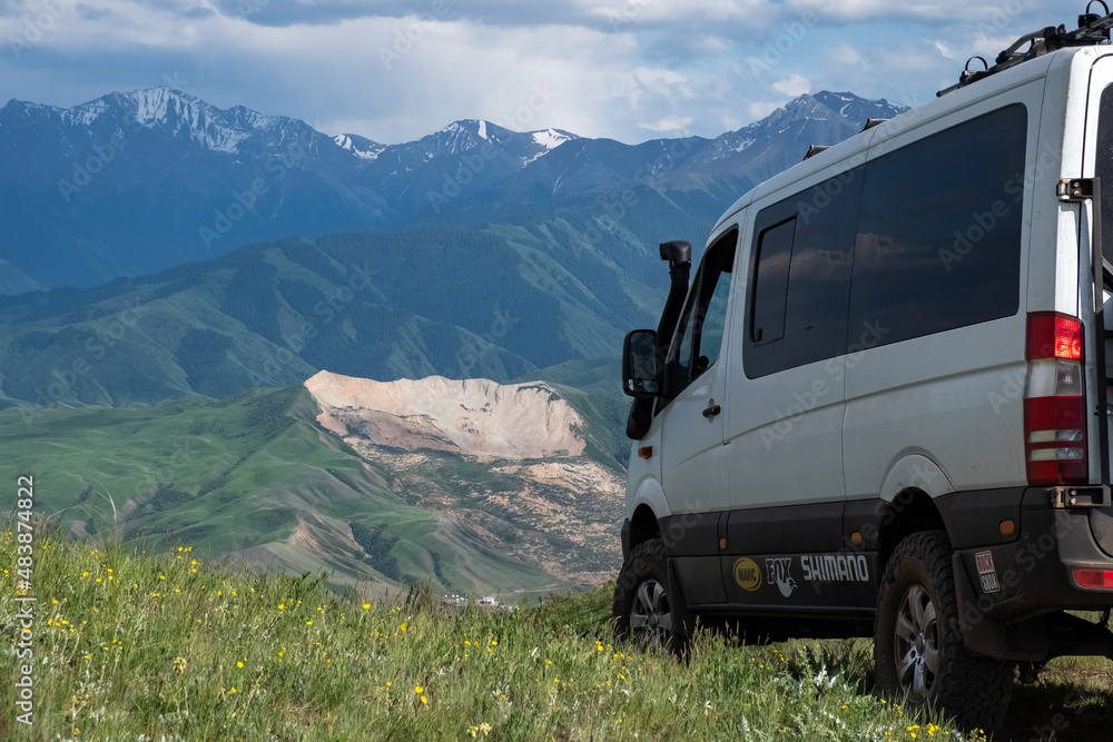 4x4 offroad van Mersedes-benz Sprinter on mountain valley. Off-road ...