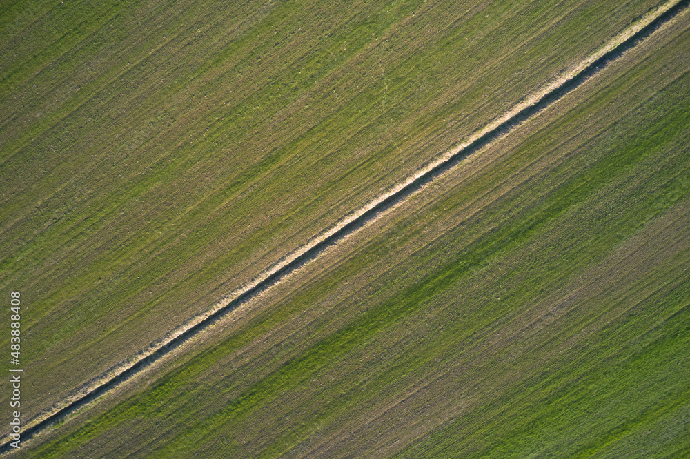 Drone view grass surface texture. Lines on the surface of the earth top ...