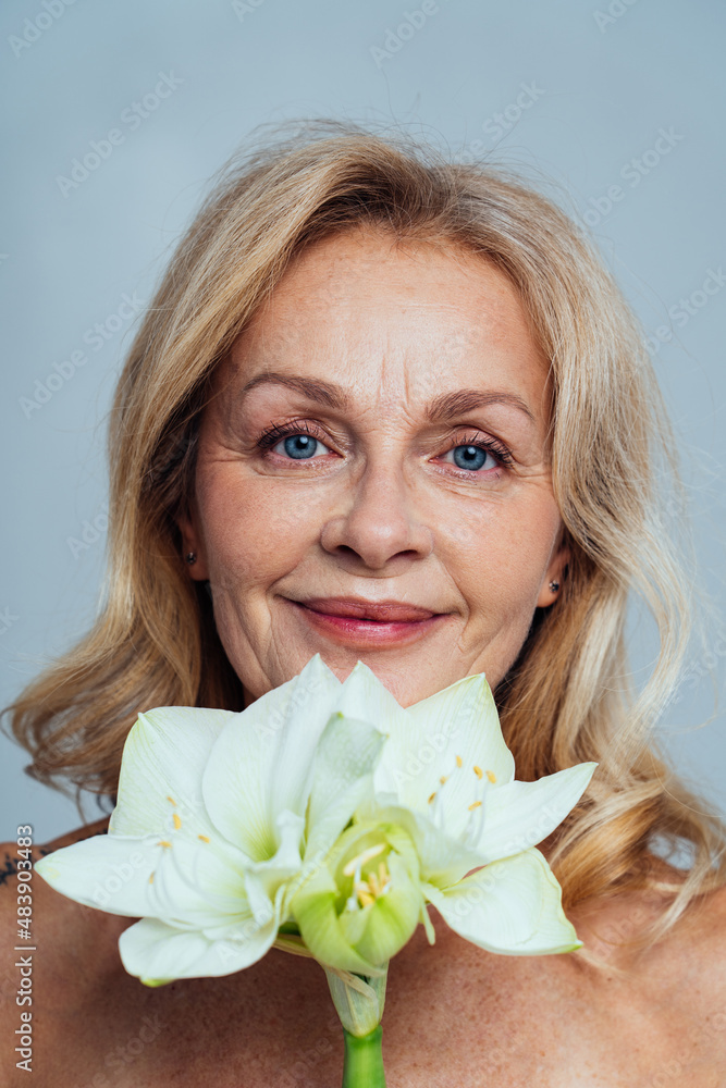 Cincematic image of a beautiful senior woman posing on a beauty photo ...