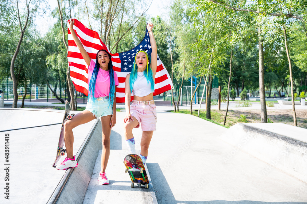 skater portraits at the skate park. Group of teenagers having fun with ...
