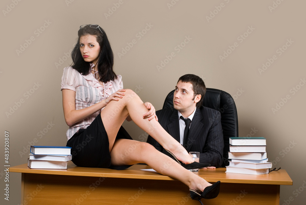 Businesswoman is seducing her boss at office Stock Photo | Adobe Stock Businesswoman is seducing her boss at office Stock Photo | Adobe Stock