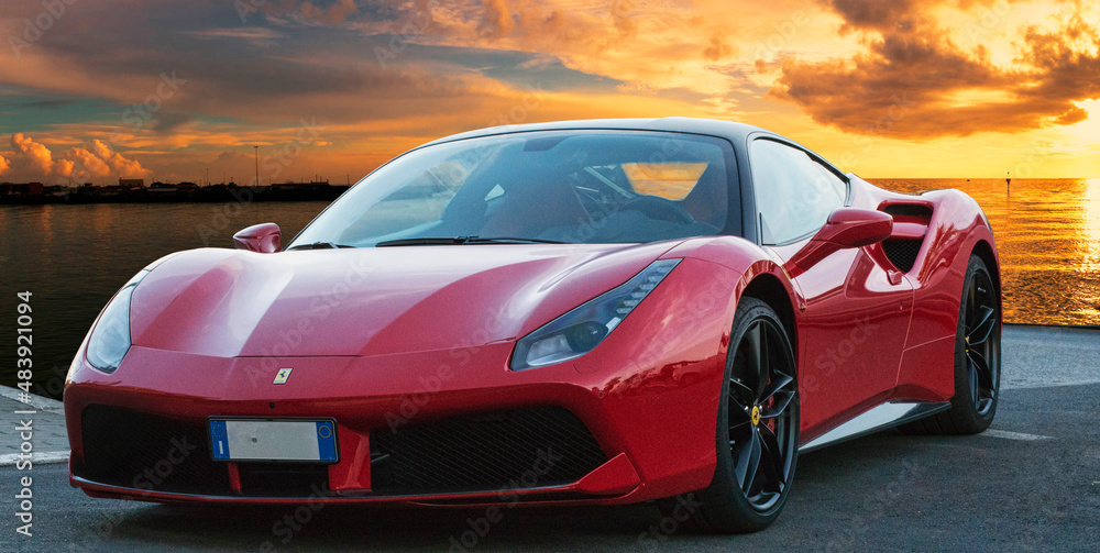 Fast and luxury design of red car model Ferrari 488 GTB located in a ...