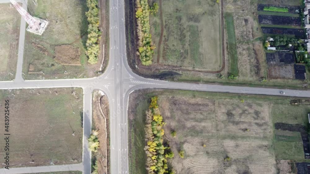 road intersection top view, drone shooting, paved intersection with ...