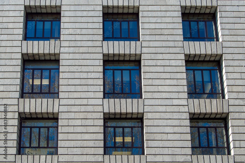 Six square windows on a white brick facade Stock Photo | Adobe Stock