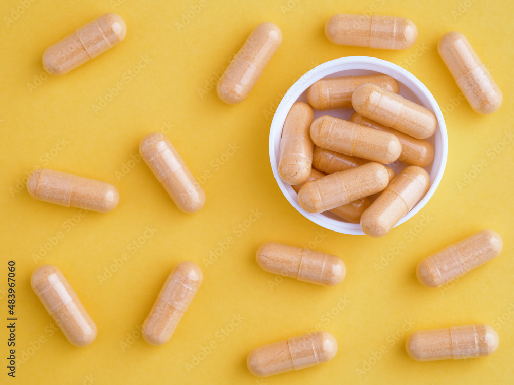 Vitamin B complex capsules in a cap with other vitamin b complex ...