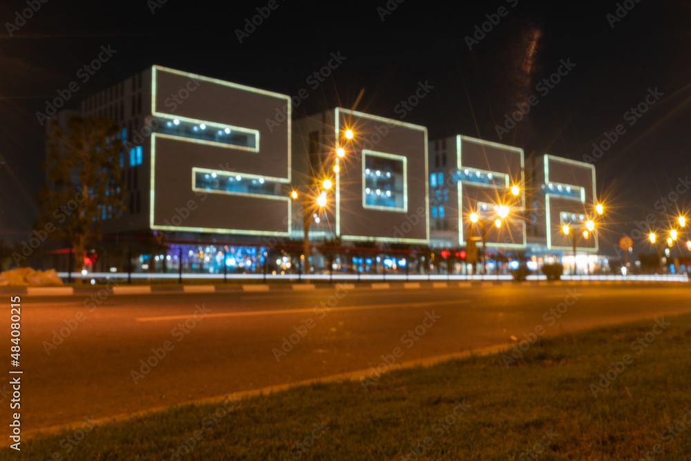 DOHA, QATAR - JANUARY 31, 2022: View of the 2022 building at night ...