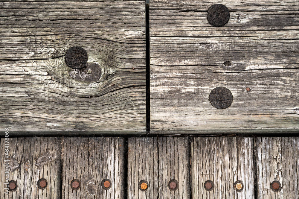 Wood Planks From A Boardwalk Connecting Together. Two large planks meet ...