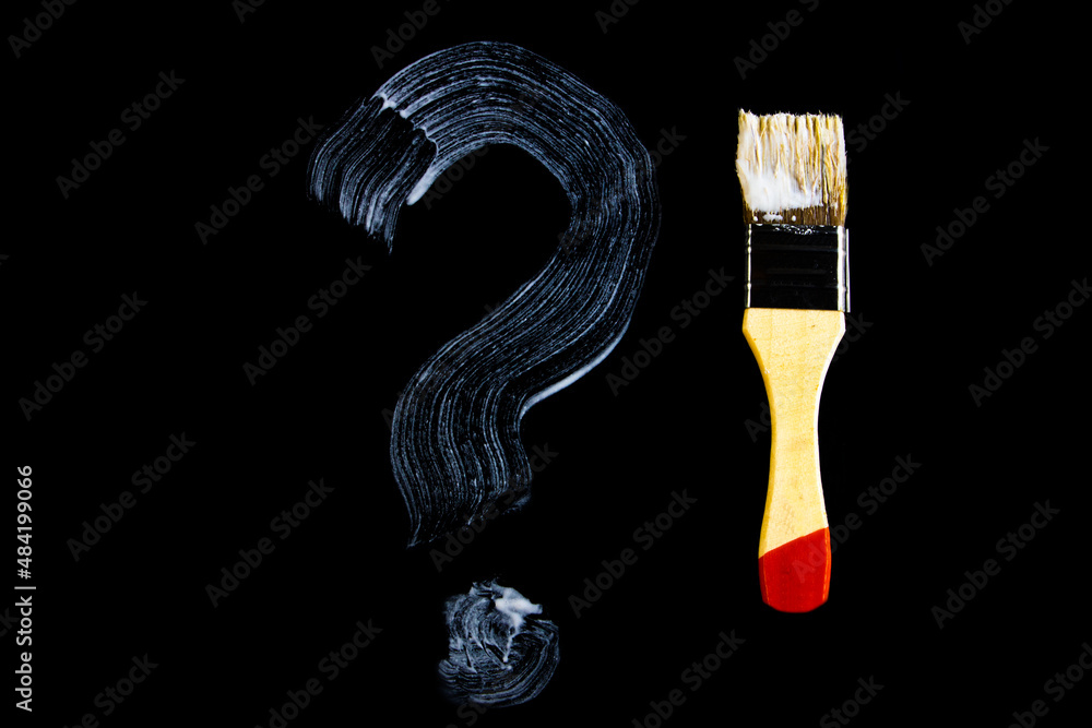 Question mark painted on a black background. White question mark. Stock ...