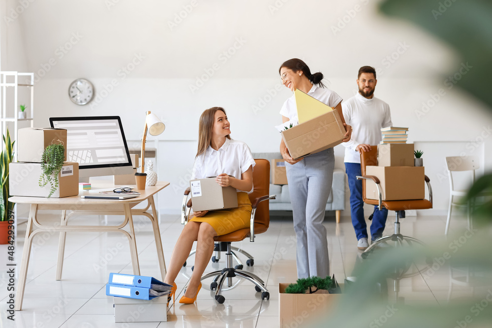 Business people packing things in office on moving day Stock Photo ...